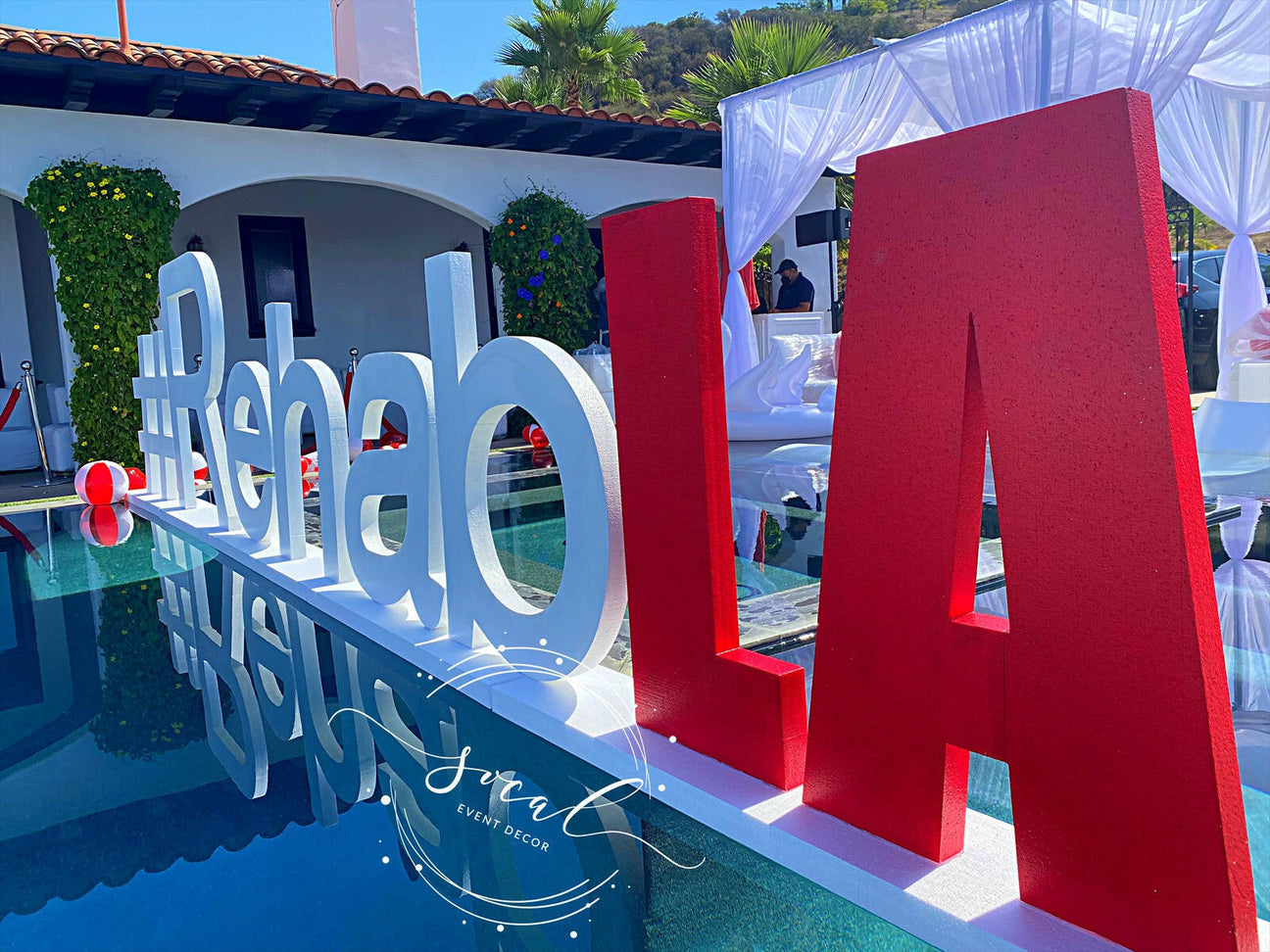 Upright custom pool float floating logo – SoCal Event Decor